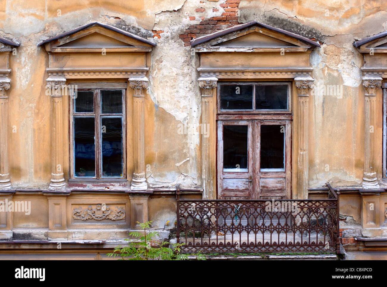 old dirty windows on old dirty wall Stock Photo - Alamy