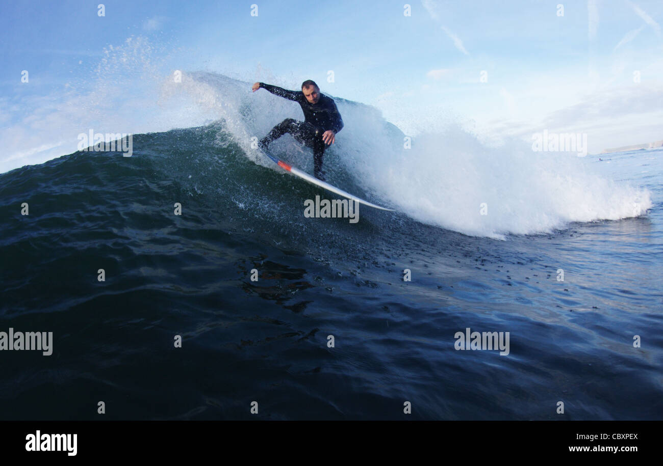 Surfing a barreling Gower reef break Gower South Wales uk Stock Photo ...