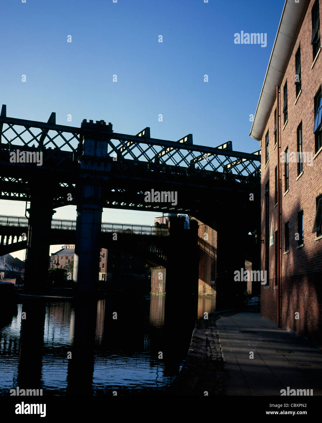 Iron Railway viaduct across Castlefield Canal Basin Manchester England ...