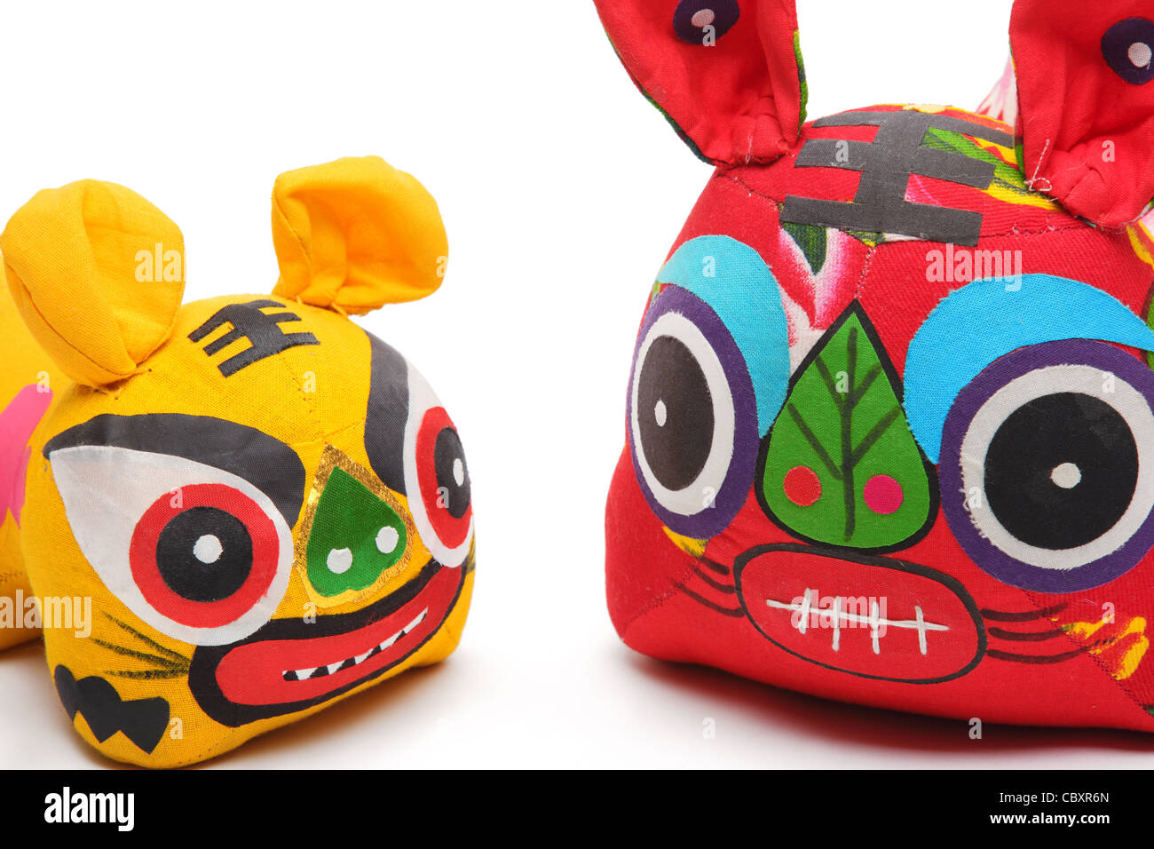 Closeup of traditional handicraft cloth tiger on white Stock Photo - Alamy