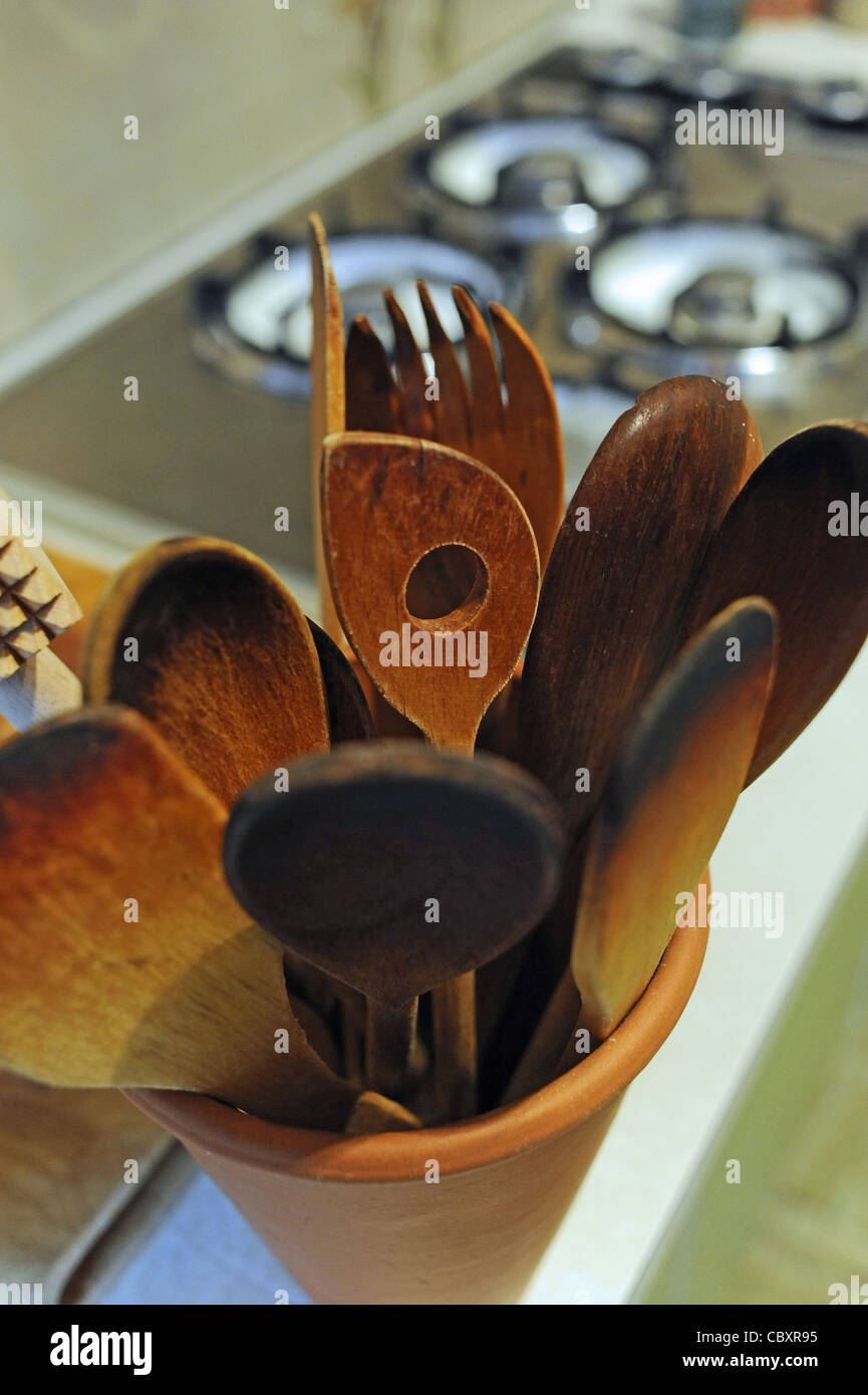 Chefs wooden spoons in domestic kitchen container pot Stock Photo - Alamy
