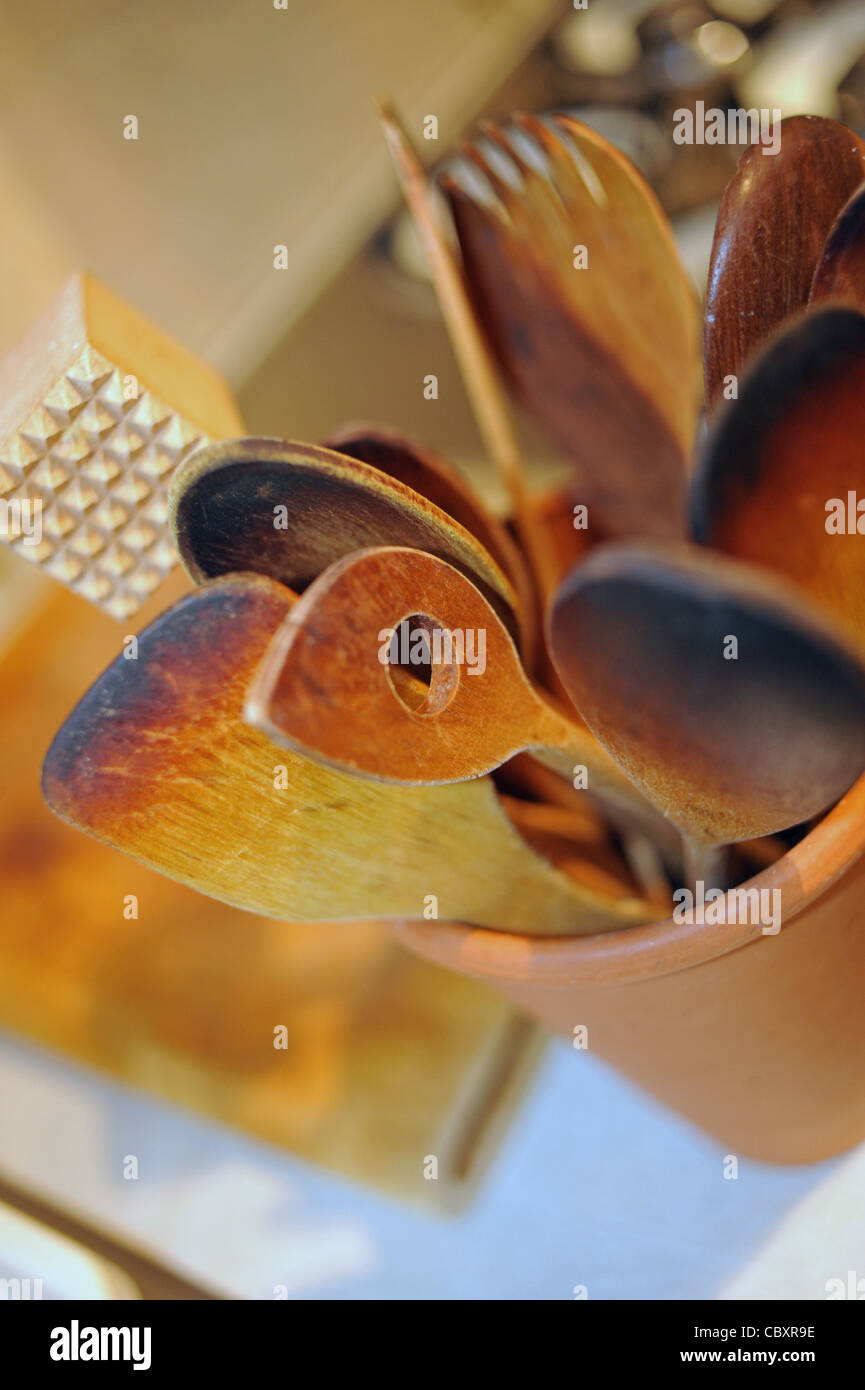 Chefs wooden spoons in domestic kitchen container pot Stock Photo - Alamy