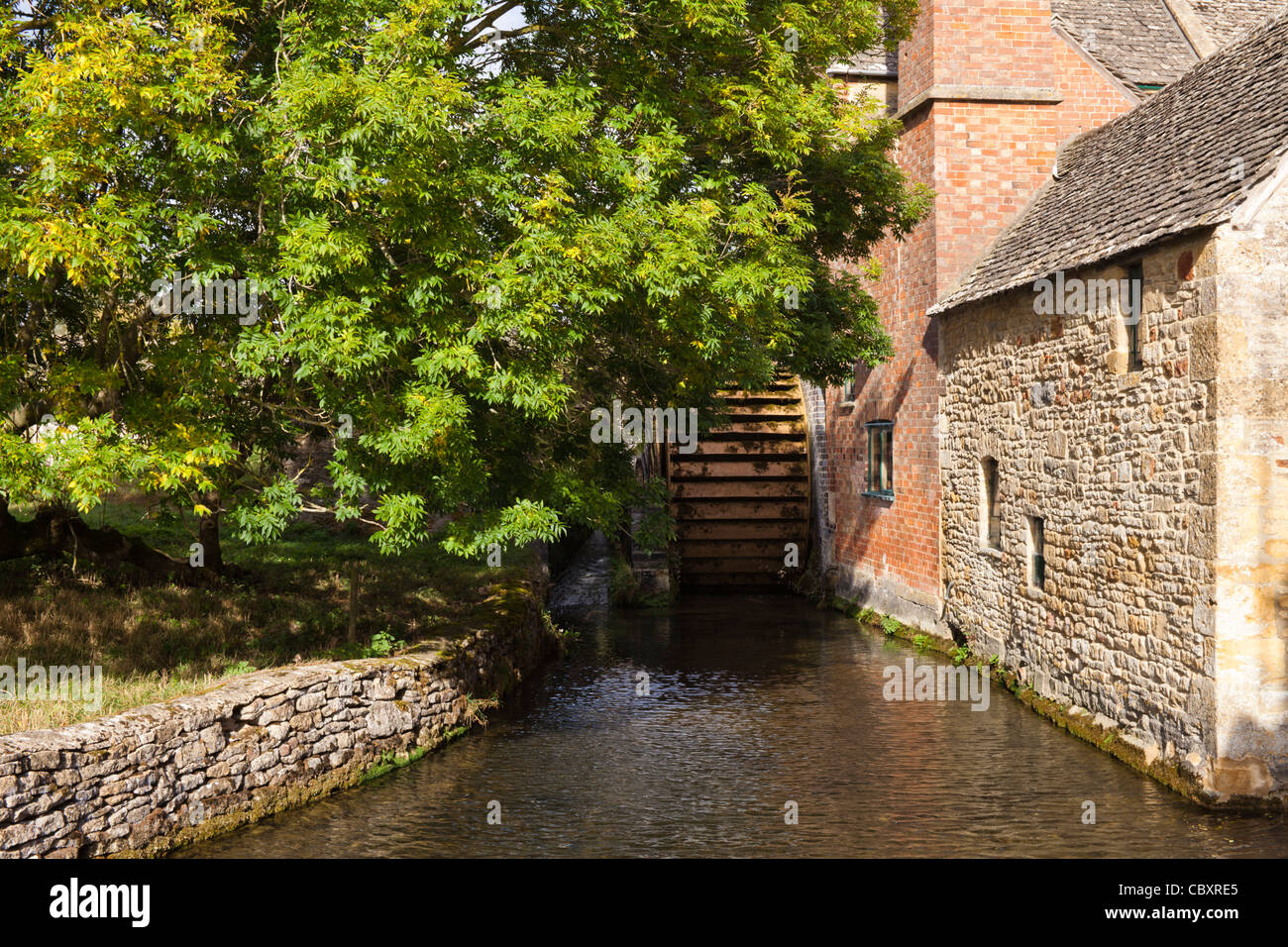 The old mill in the Cotswold village of Lower Slaughter ...