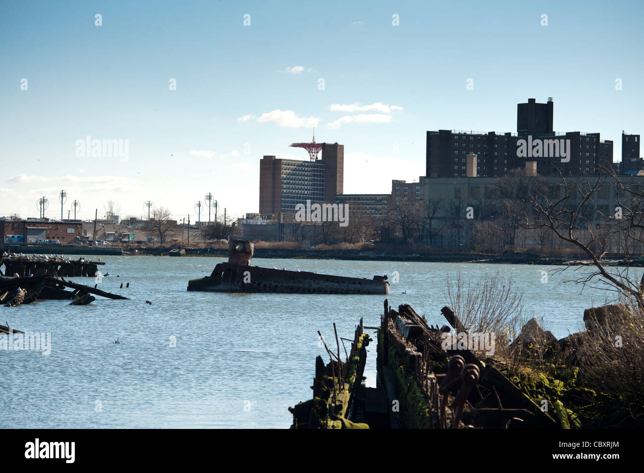 The abandoned submarine Questar I, center, among the burnt remains of ...