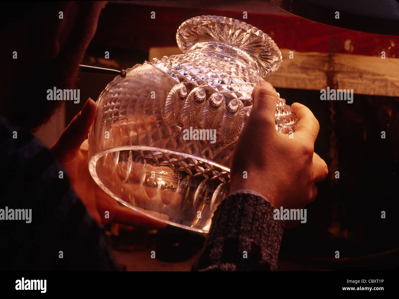 Engraver adds final touches to crystal trophy bowl in Waterford Stock ...