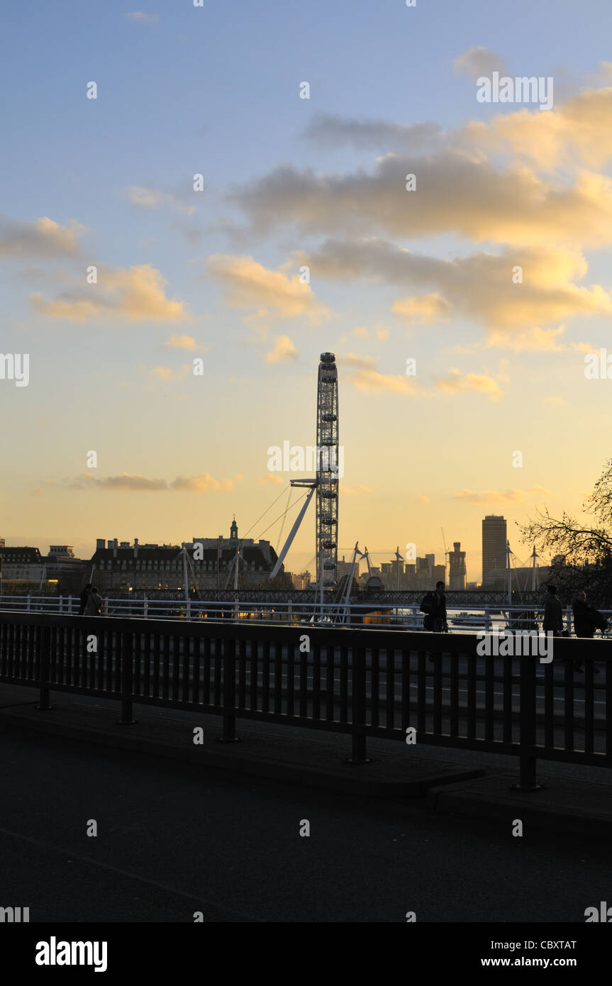 Profile view of London Eye at sunset Stock Photo - Alamy