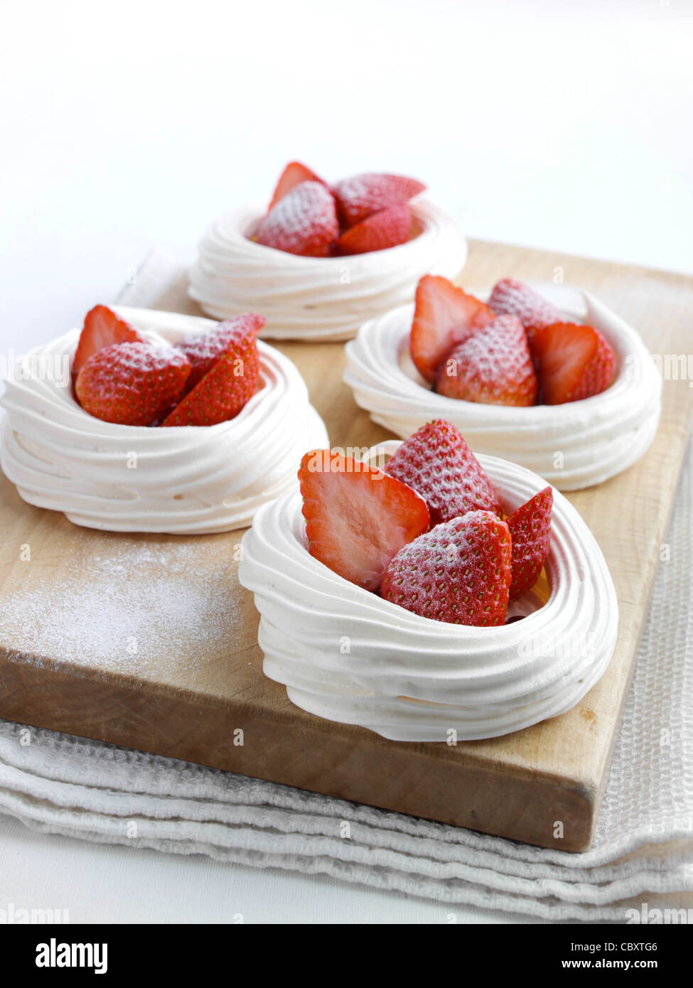 Strawberry meringue nests Stock Photo - Alamy