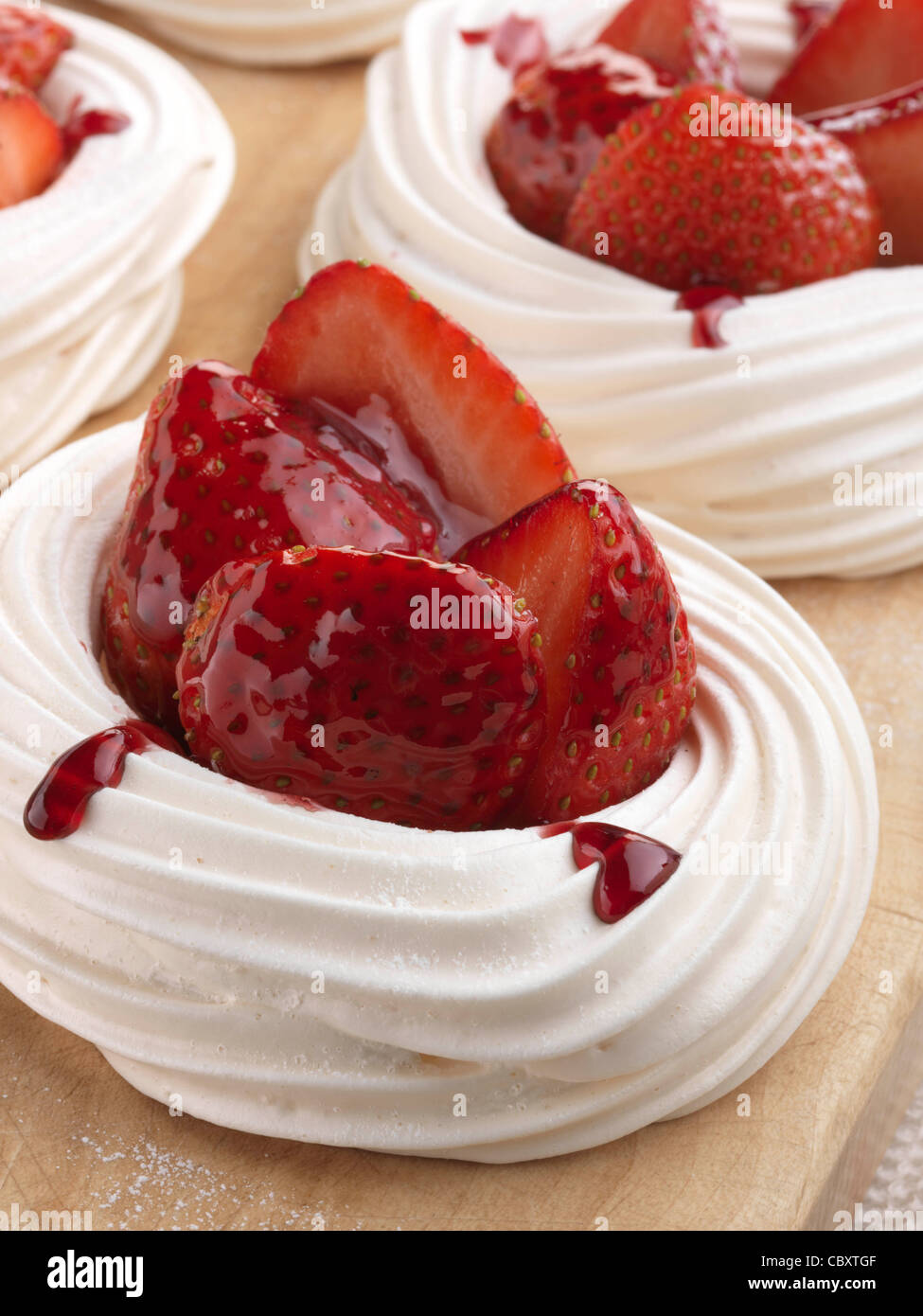 Strawberry meringue nest Stock Photo - Alamy