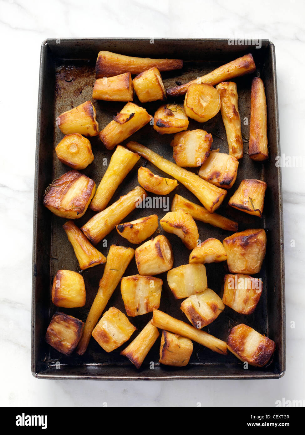 Crisp golden roast parsnips side order hi-res stock photography and ...