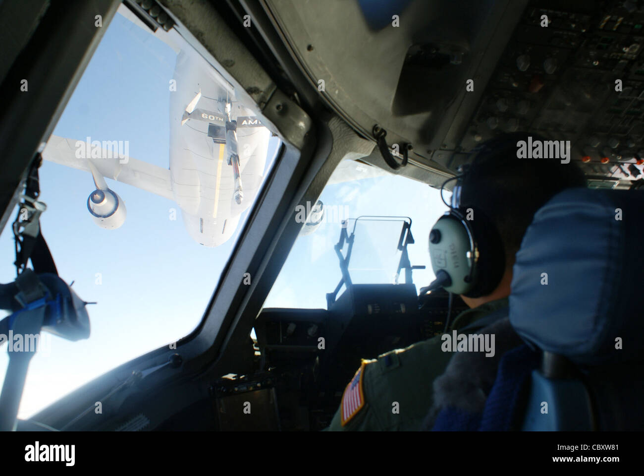 C-17 Globemaster III pilot 1st Lt. Andre Dieu positions the aircraft ...