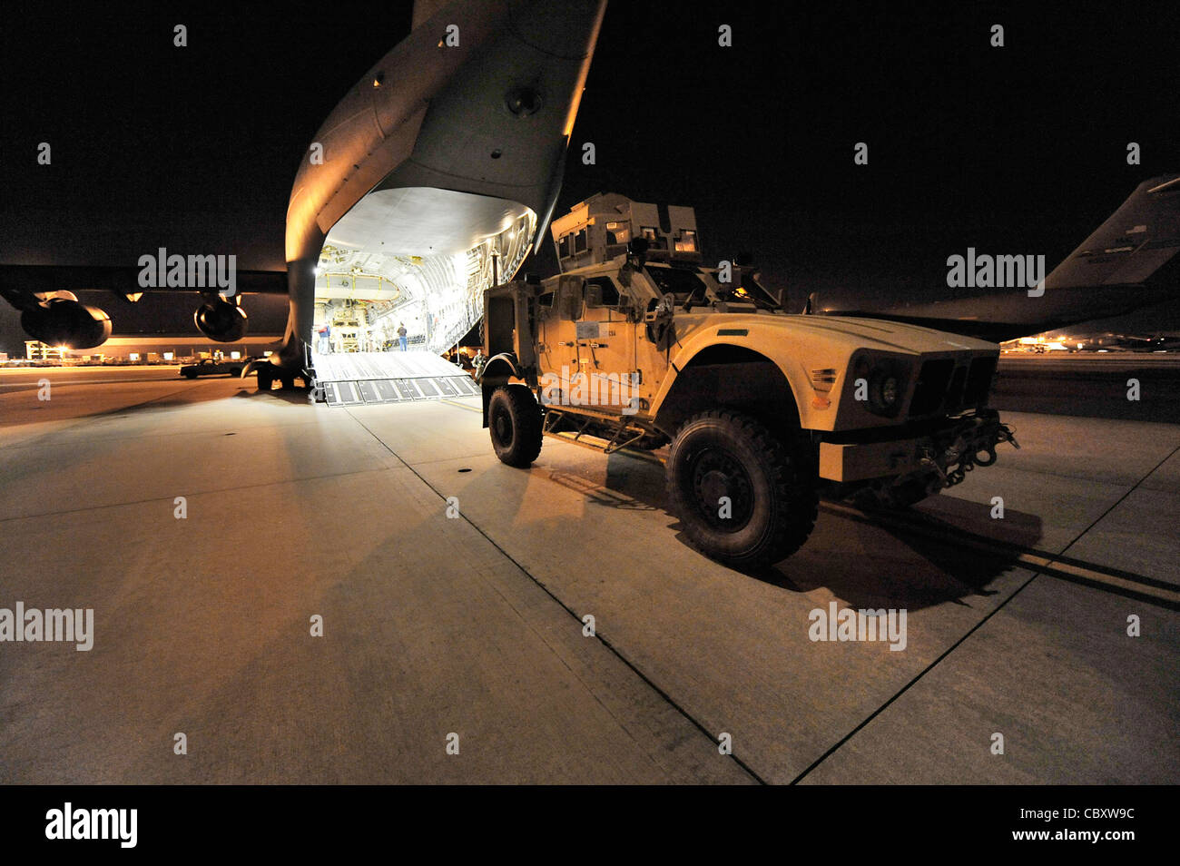 A mine-resistant, ambush-protected armored all-terrain vehicle is ...