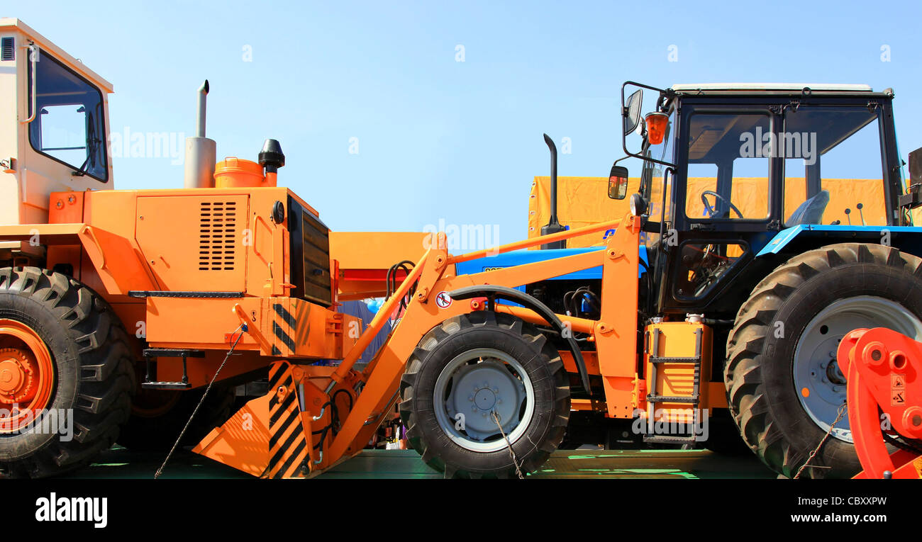 Part of the two tractors, side view Stock Photo - Alamy
