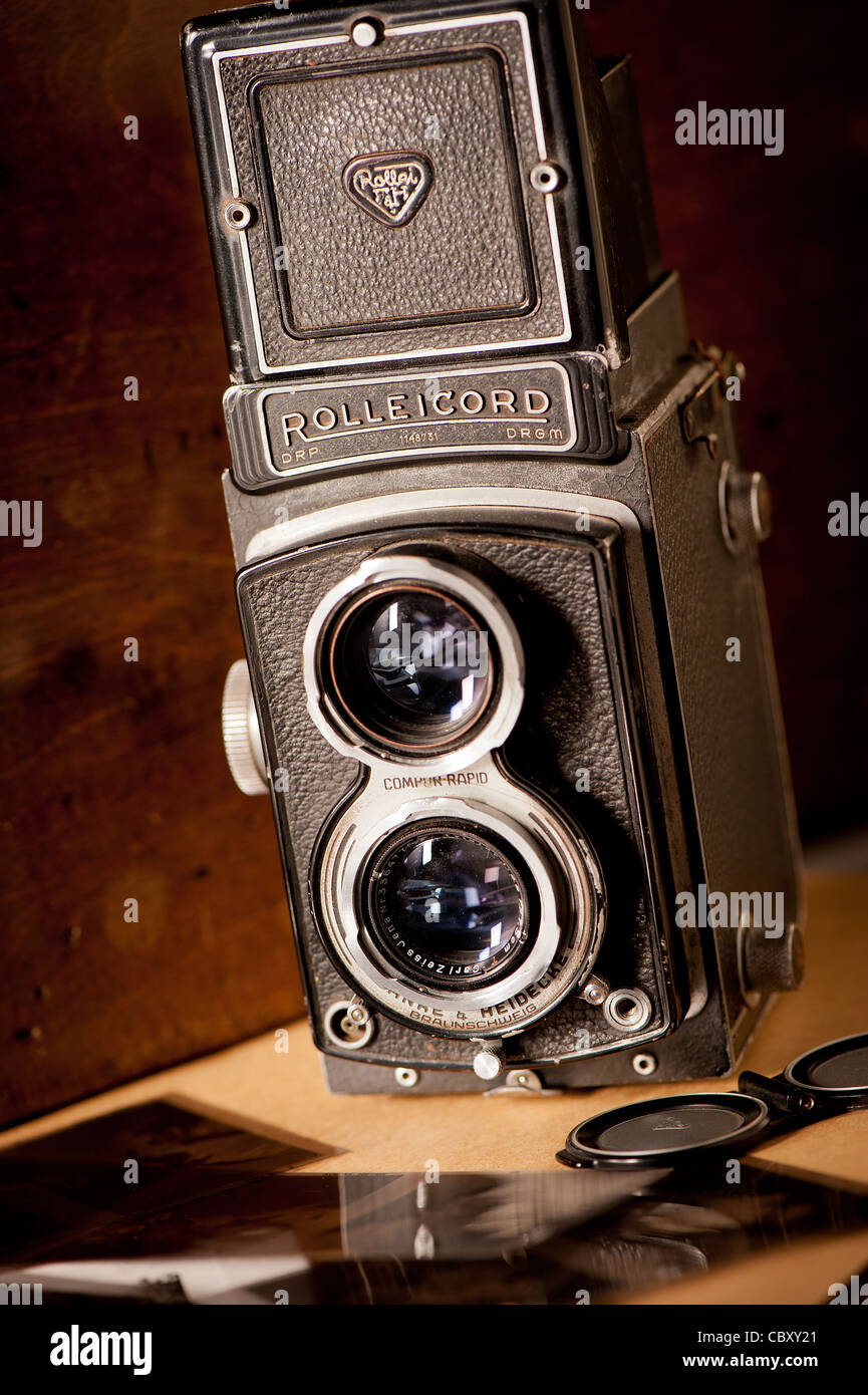 Vintage camera with negatives Stock Photo - Alamy