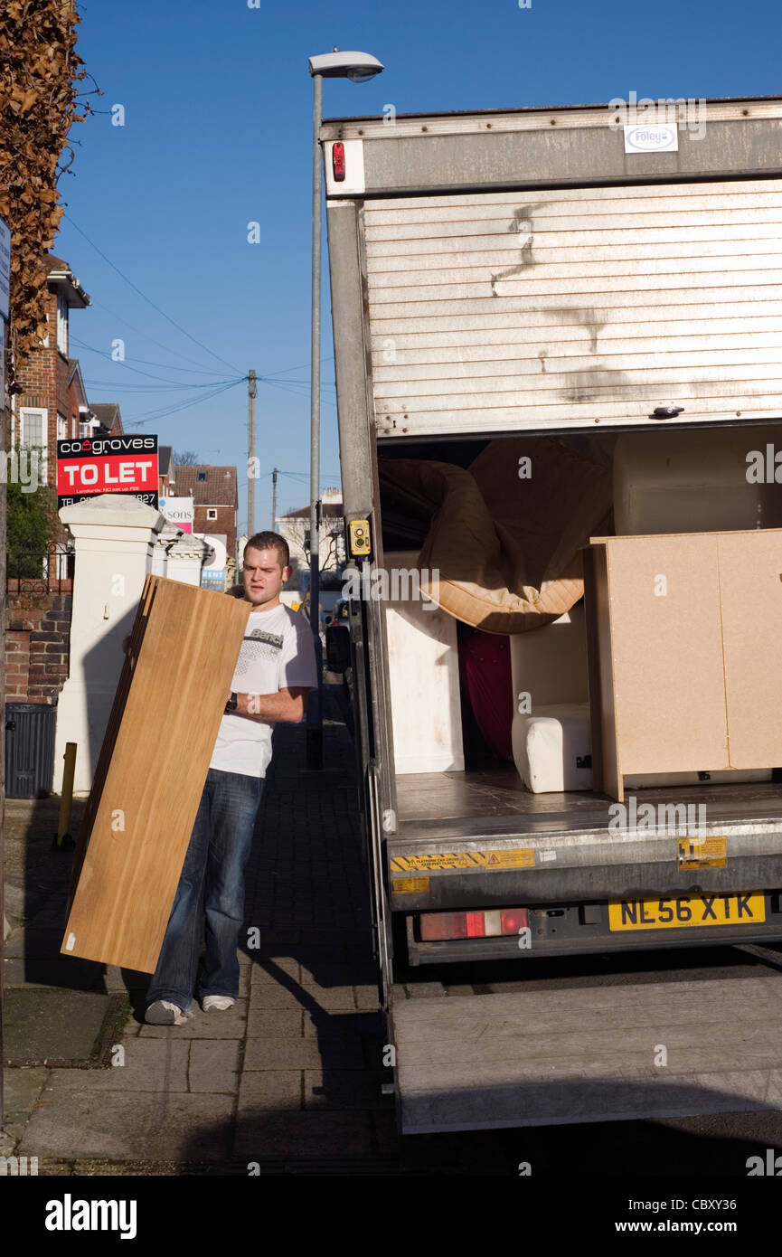 Man loading furniture hi-res stock photography and images - Alamy