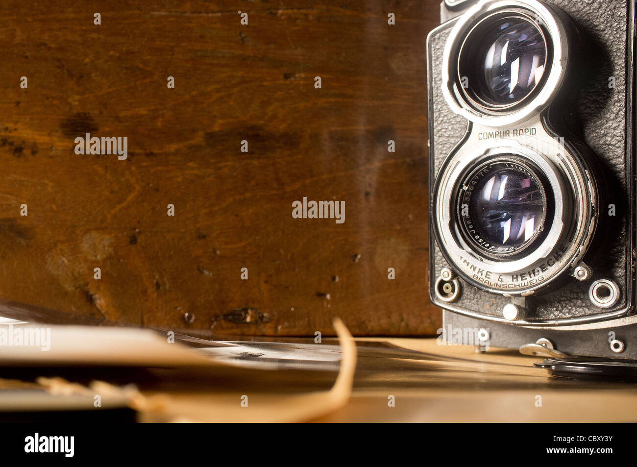 Vintage camera with negatives Stock Photo - Alamy