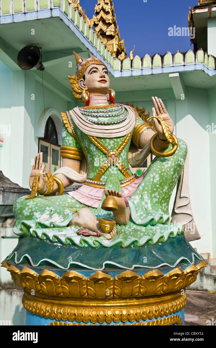 Deva statue in myanmar style molding art Stock Photo - Alamy