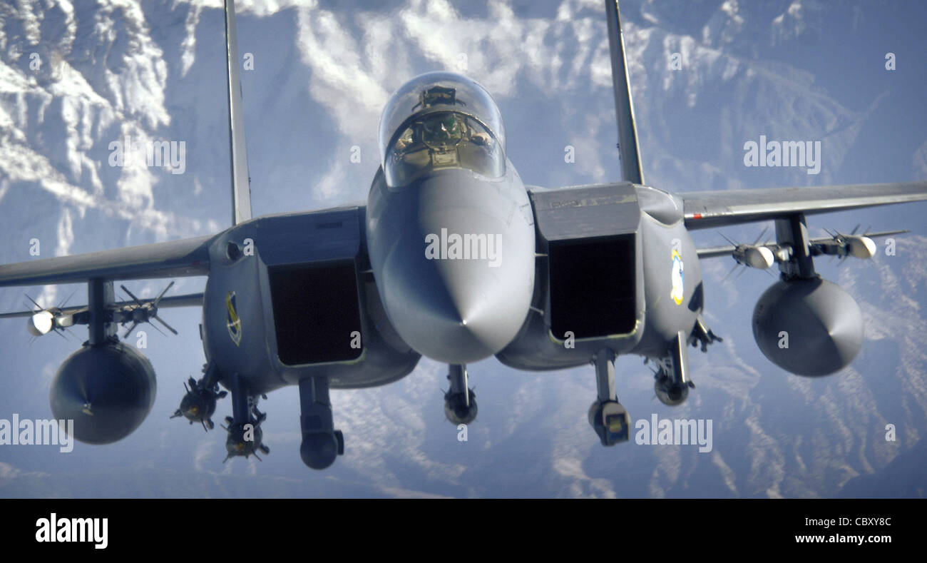 An F-15E Strike Eagle soars over the mountains of Afghanistan providing ...