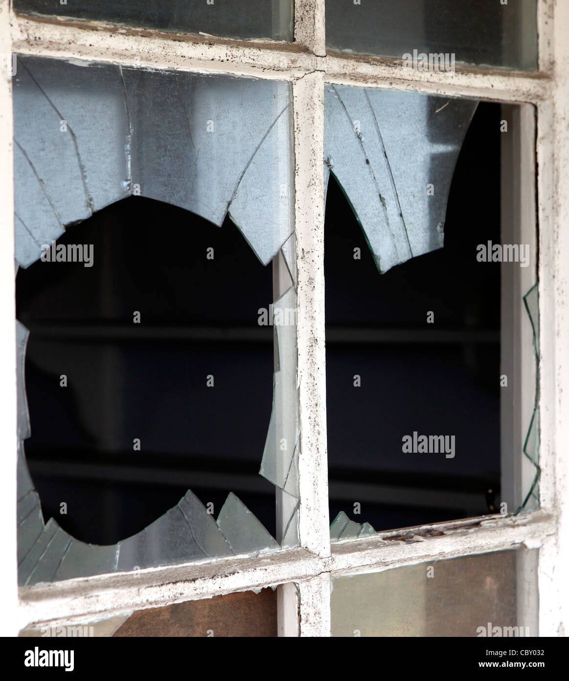 Vandalized broken windows Stock Photo - Alamy