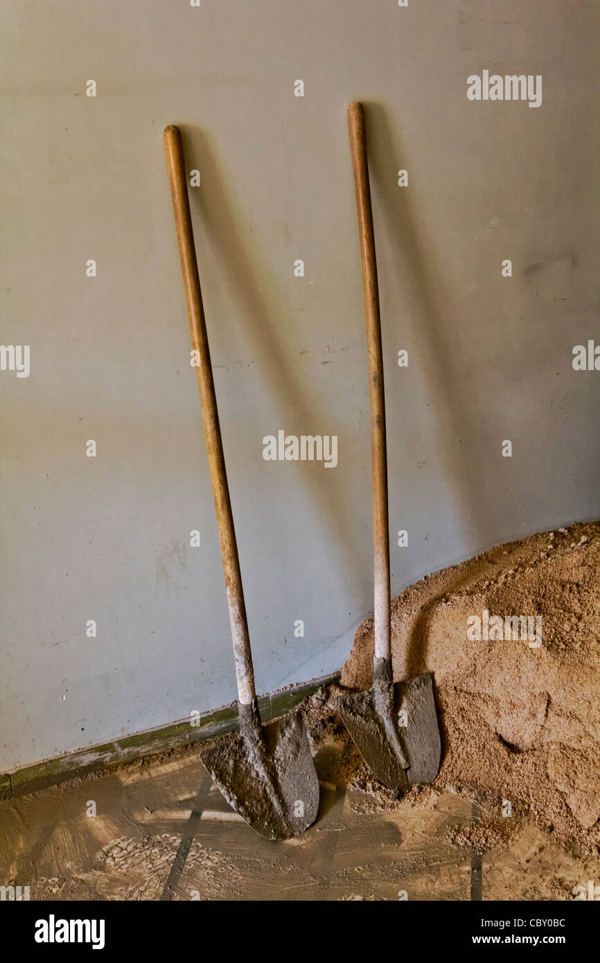 Two shovel on a construction site Stock Photo - Alamy