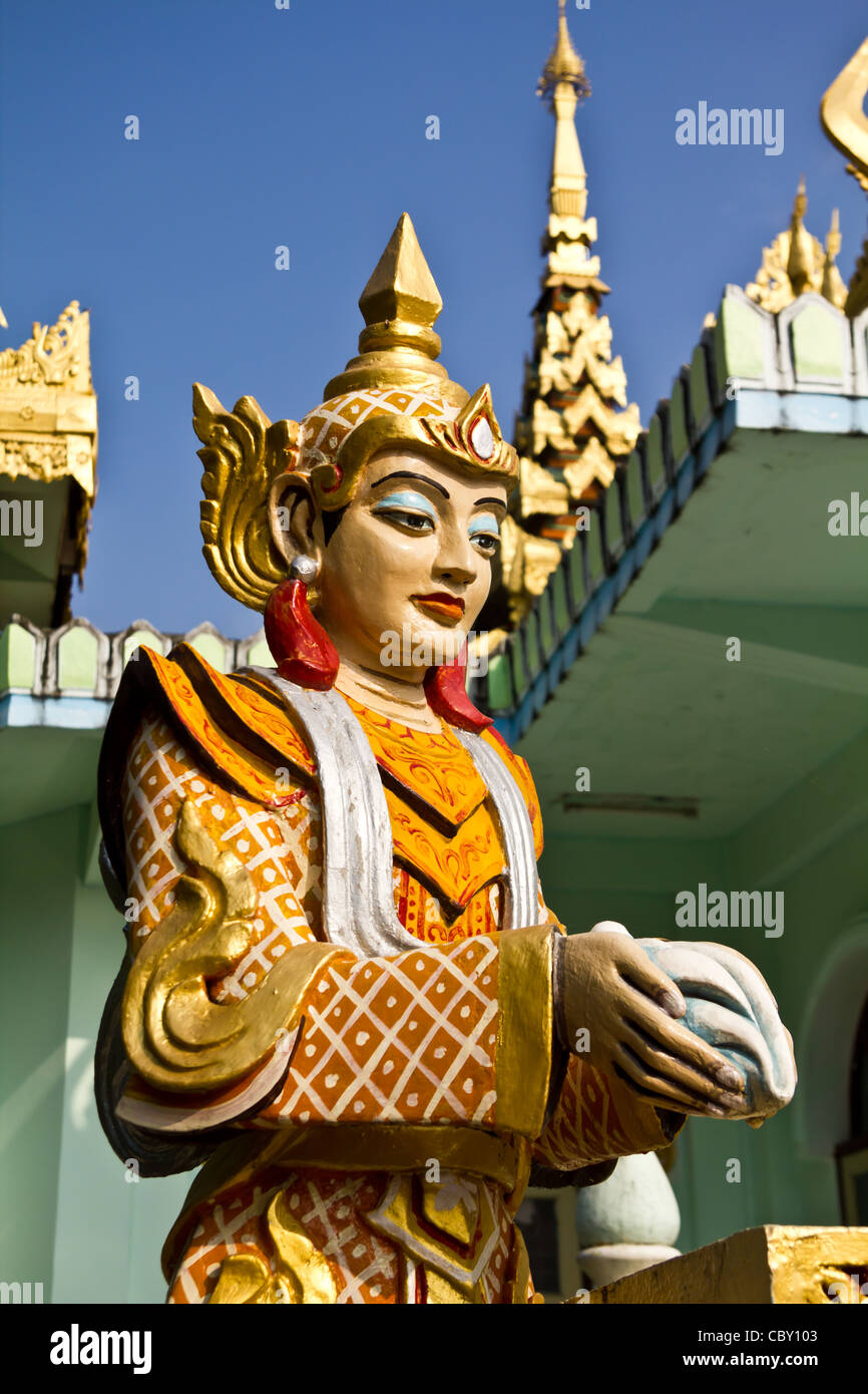 Deva statue in myanmar style molding art at temple Stock Photo - Alamy