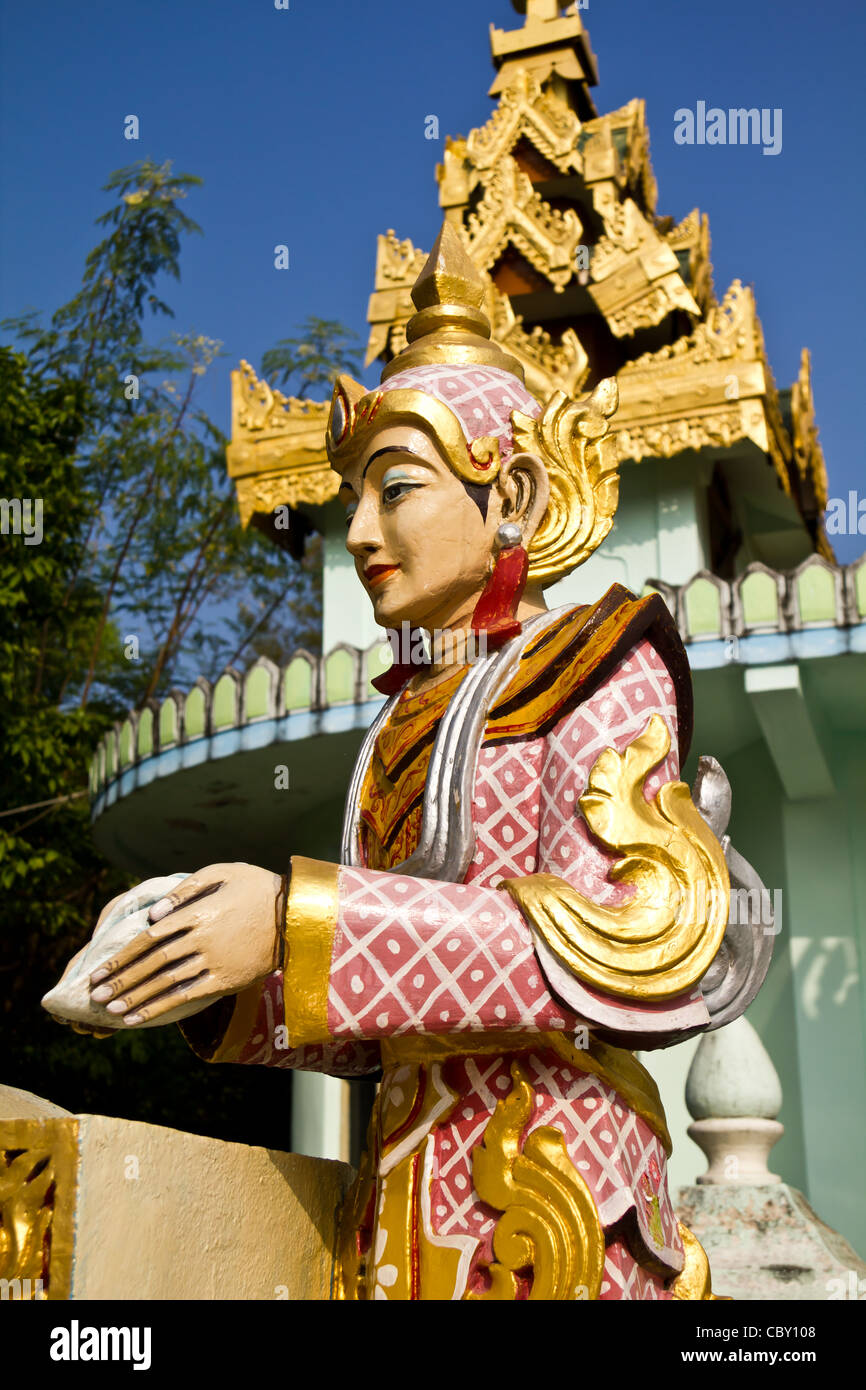 Deva statue in myanmar style molding art at temple Stock Photo - Alamy
