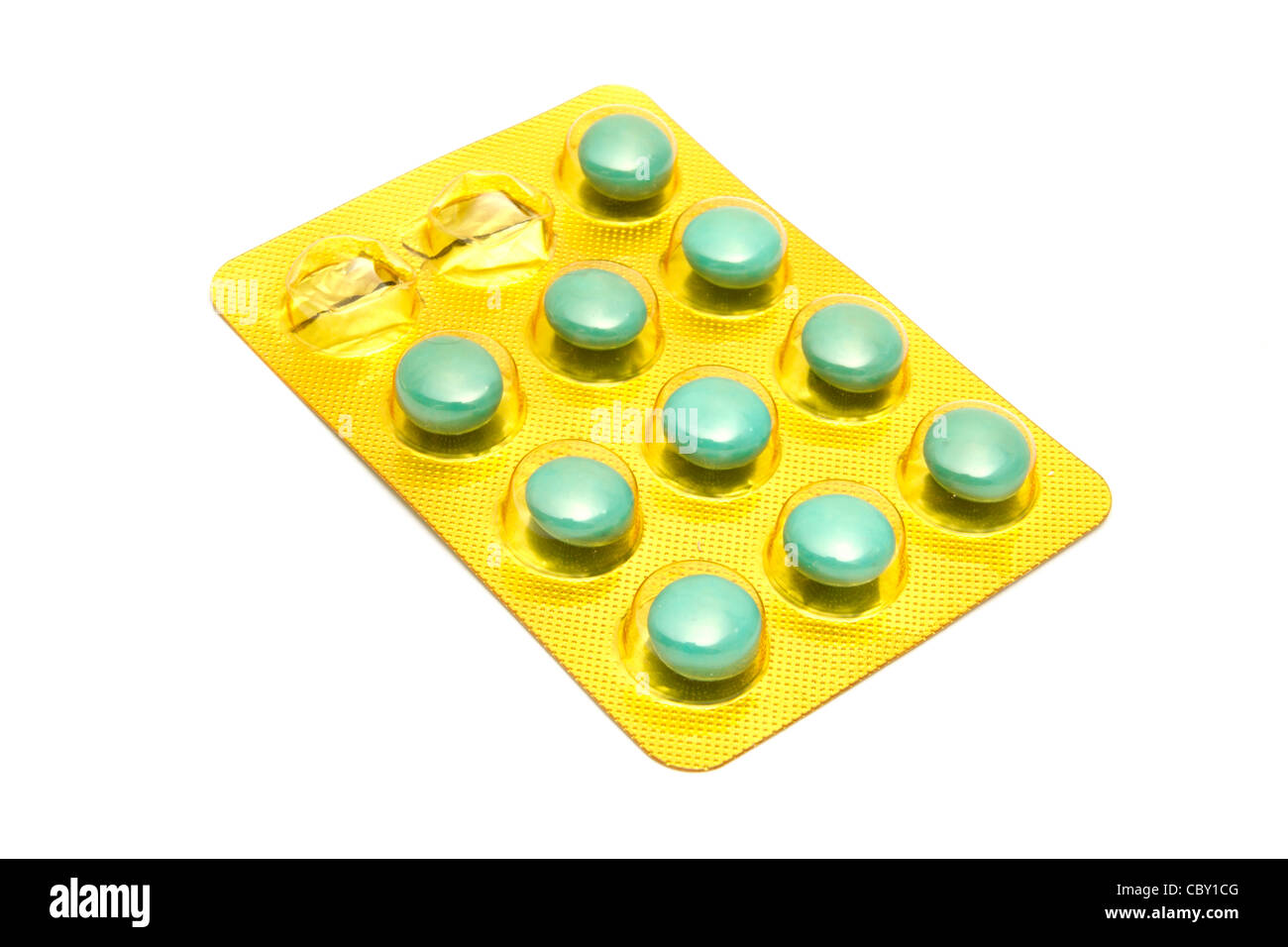 Package of green pills isolated on white background Stock Photo - Alamy