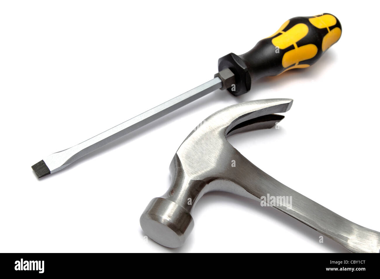 Screwdriver and hammer closeup on white background Stock Photo - Alamy