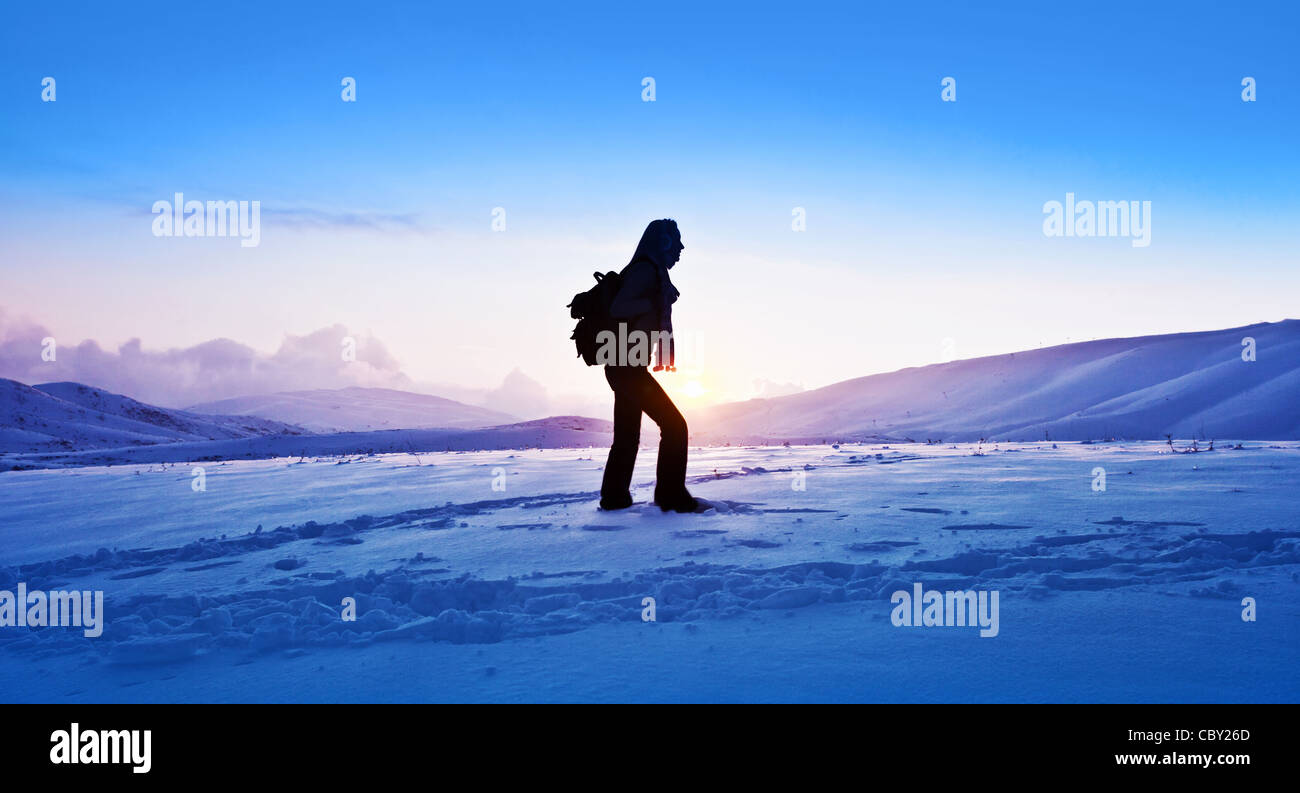 Winter sun woman walking shadow hi-res stock photography and images - Alamy