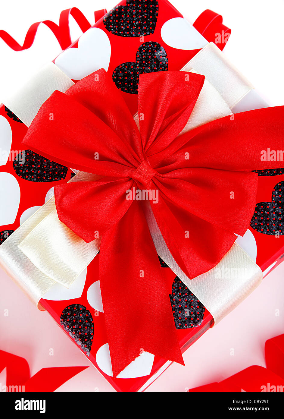 Red romantic gift box with silk bow isolated on white background ...