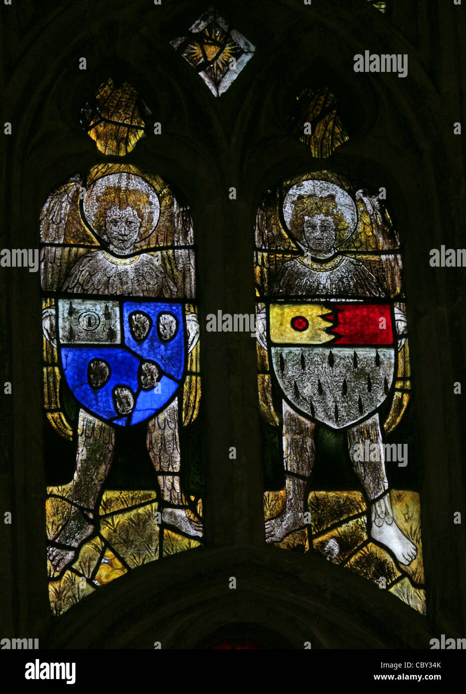 A 15th century stained glass window depicting armorial shields of ...