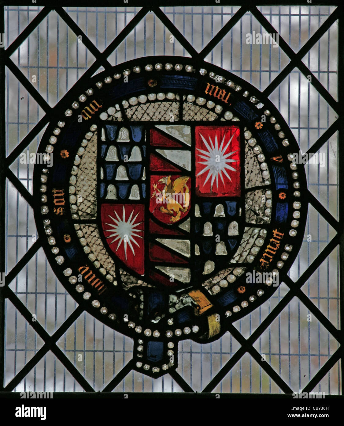 A stained glass window depicting heraldic shields, St Peter & St Paul ...