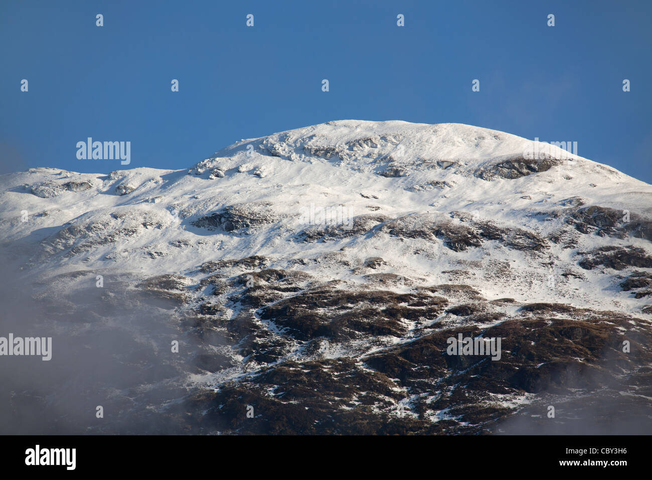 Area of Loch Lomond, Scotland. Picturesque view of a snow covered Ben ...