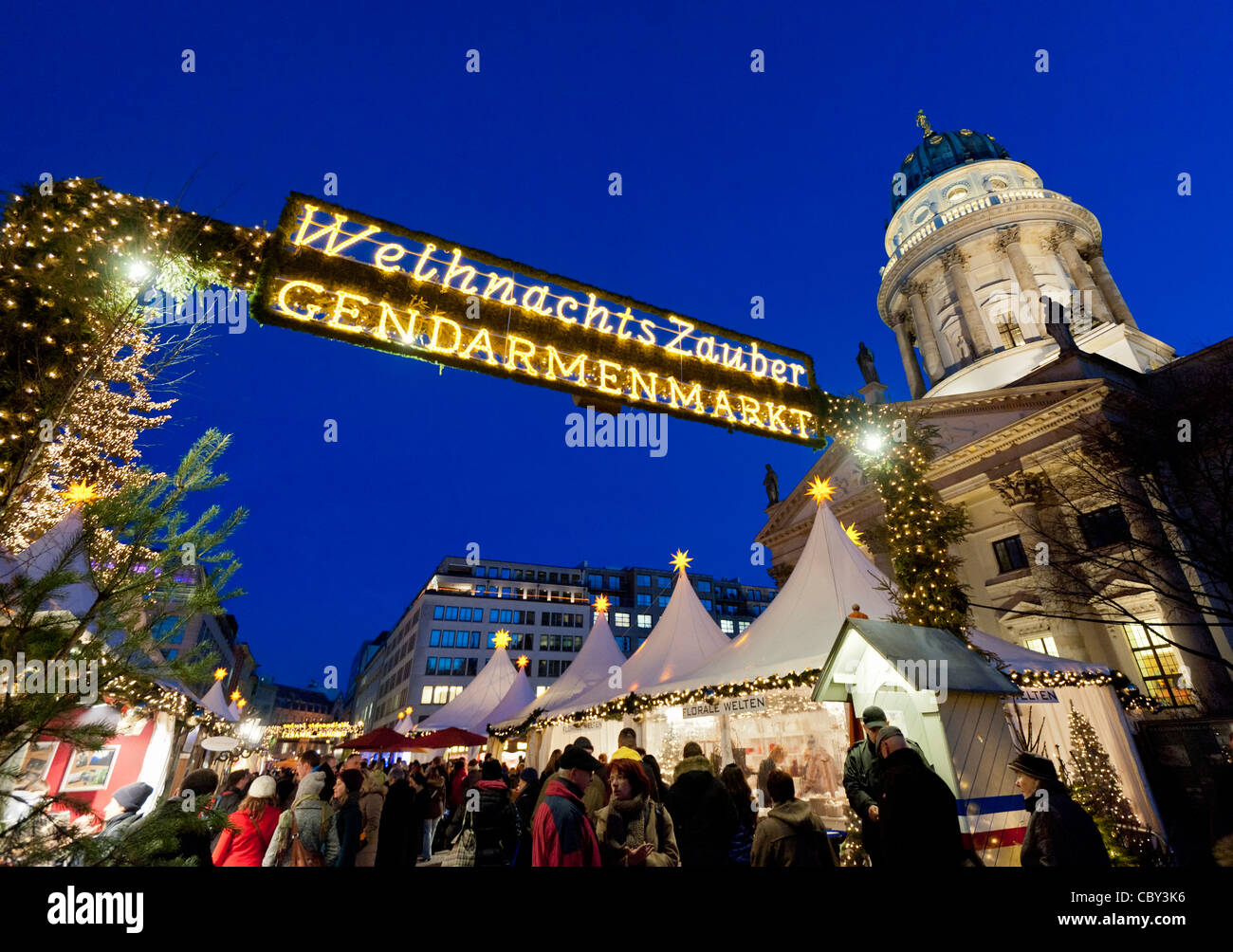 Night view of busy traditional German Christmas Market in ...
