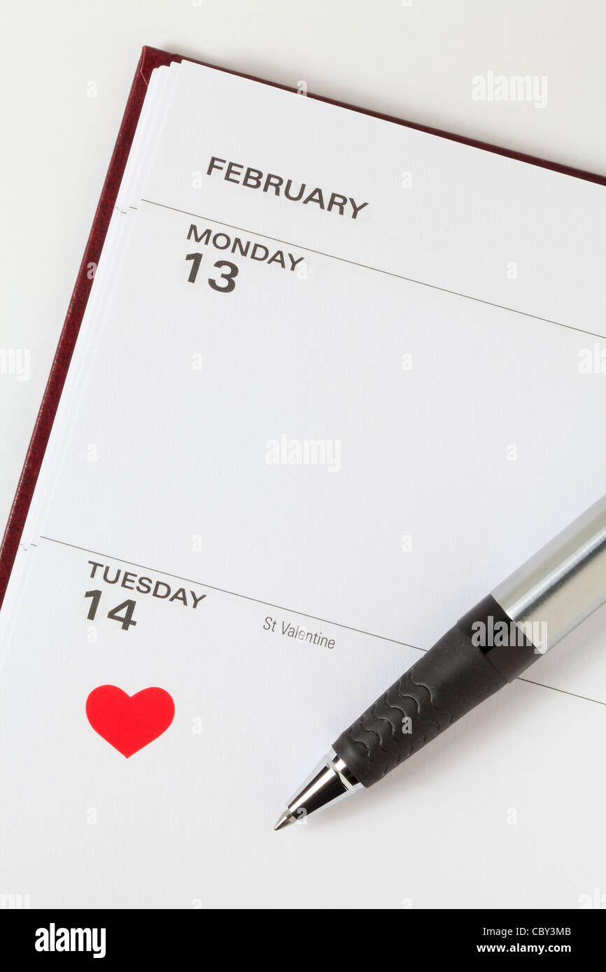 Heart and Pen on Valentine's Day in a diary Stock Photo - Alamy