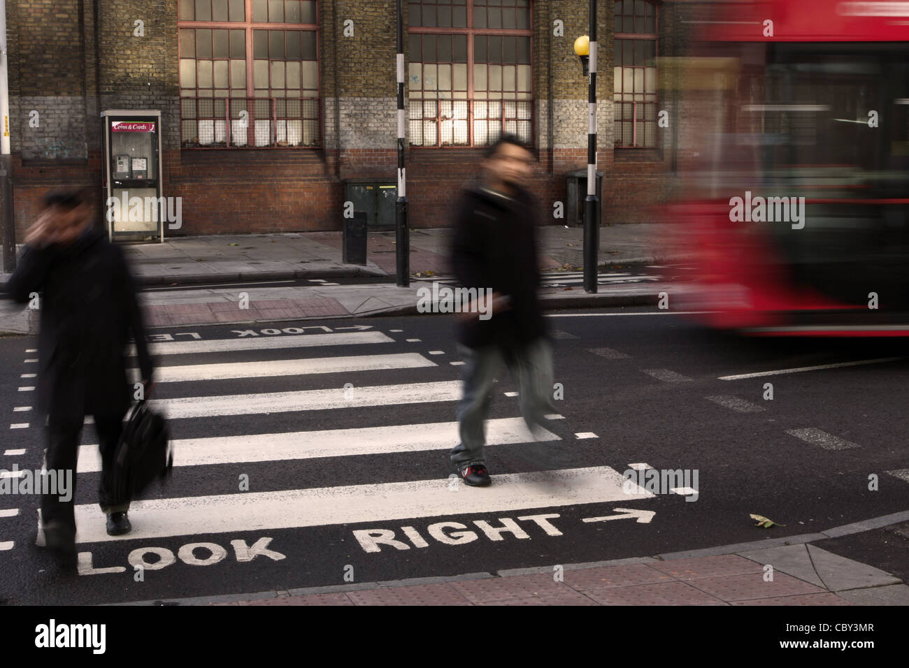 Two men crossing road hi-res stock photography and images - Alamy