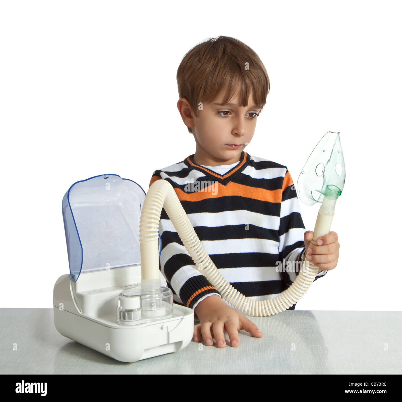little boy makes inhalation with nebuliser Stock Photo - Alamy