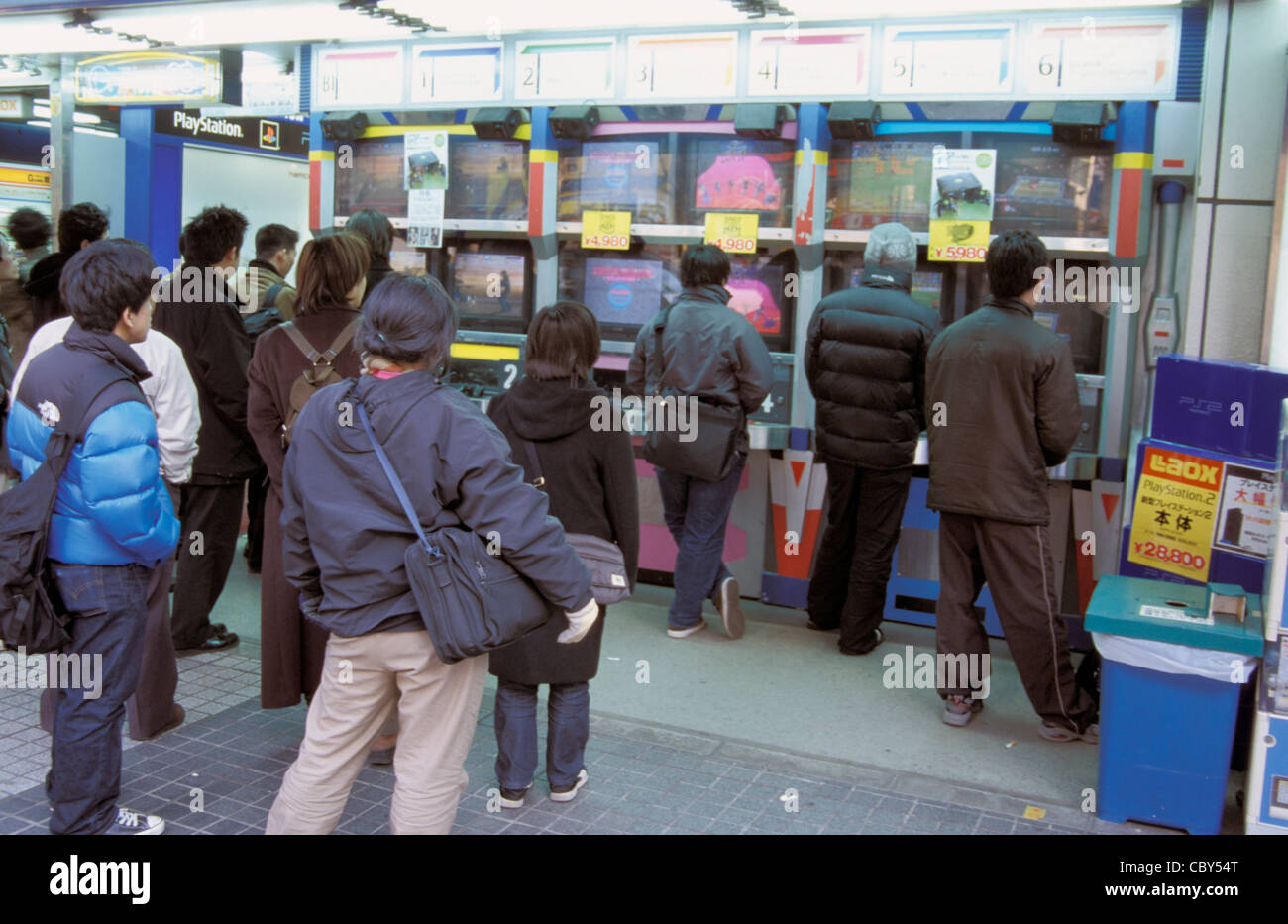 Akihabara Japan Tokyo Shoppers watching computer gamers outside shop ...