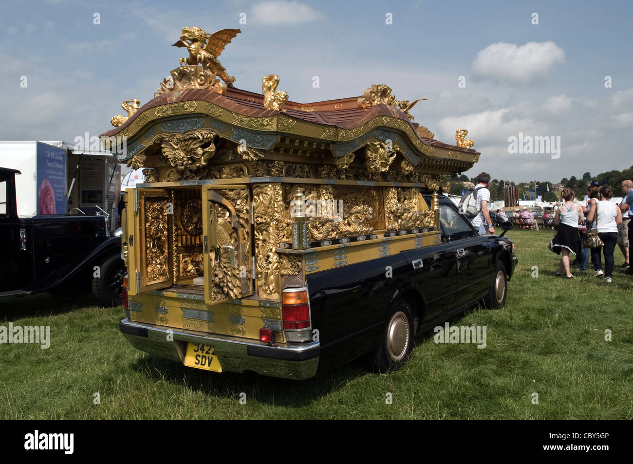 old golden hearse Stock Photo - Alamy