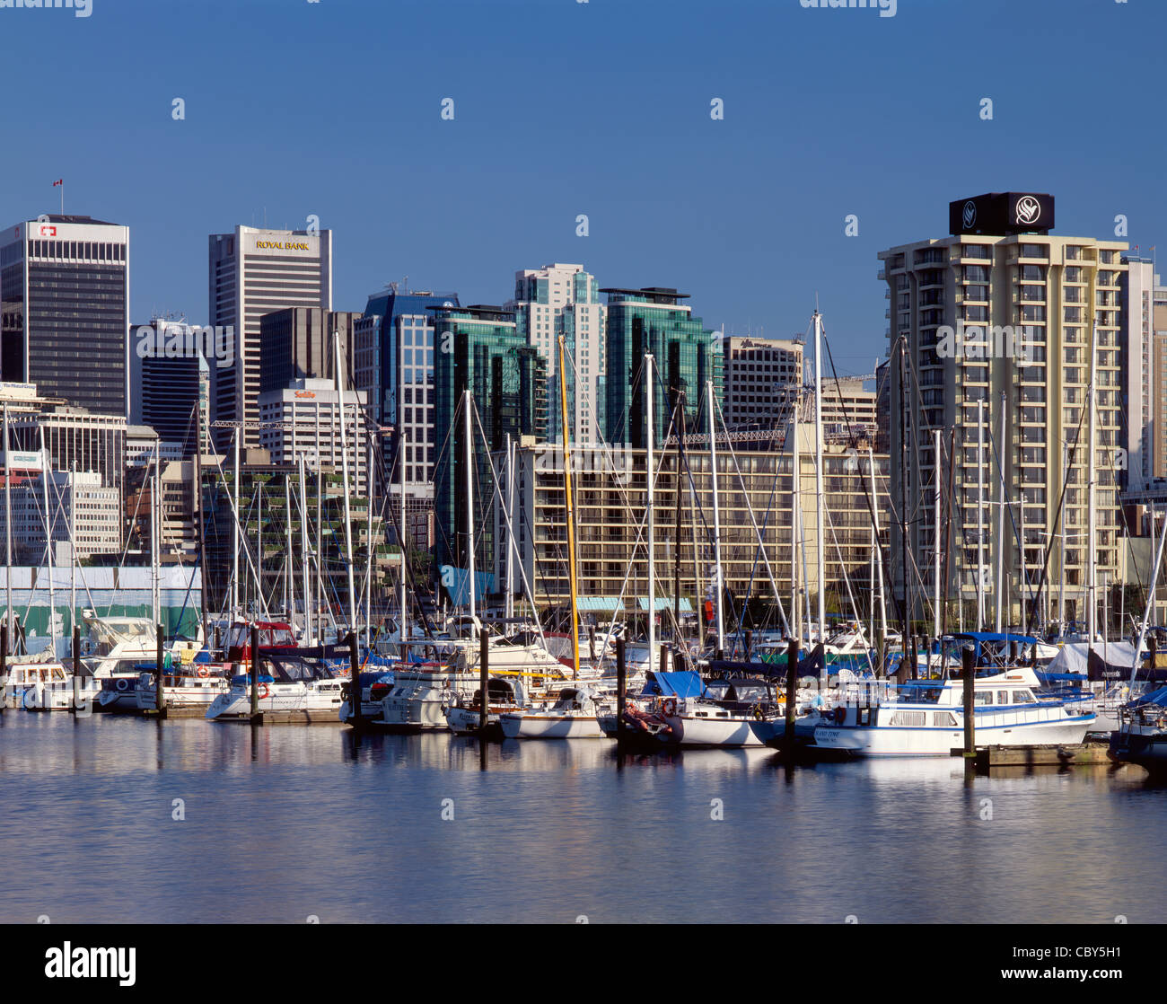 Vancouver; downtown skyline rises above waters of Coal Harbor ...