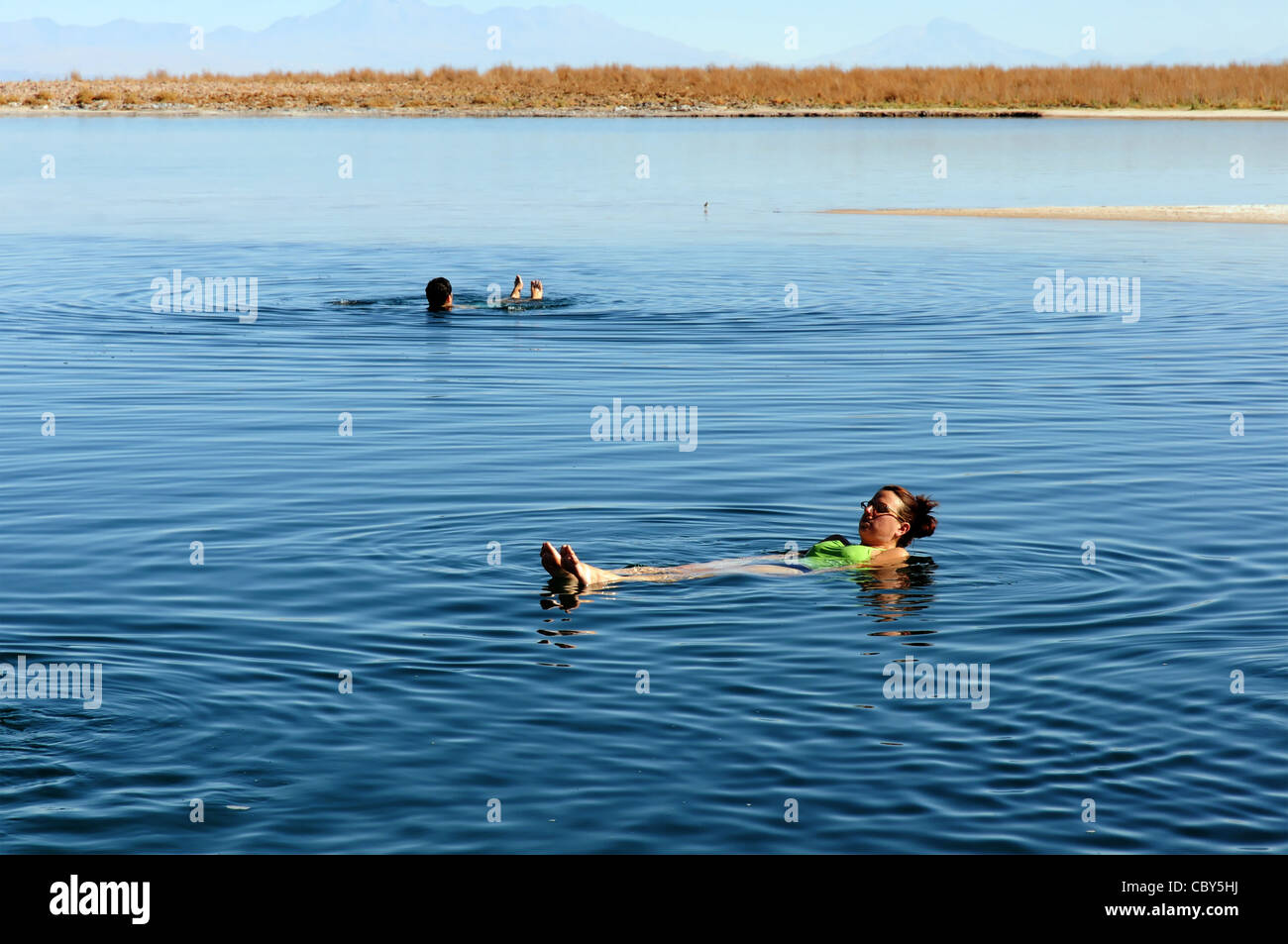 Tourists floating in Laguna Cejar (also called Laguna Cejas) in ...