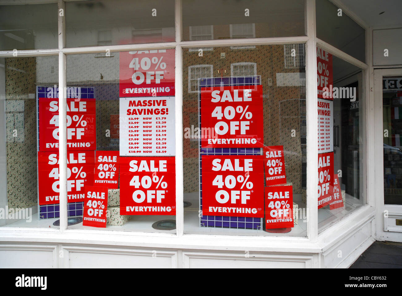 Boxing day sale posters in a shop window Stock Photo - Alamy