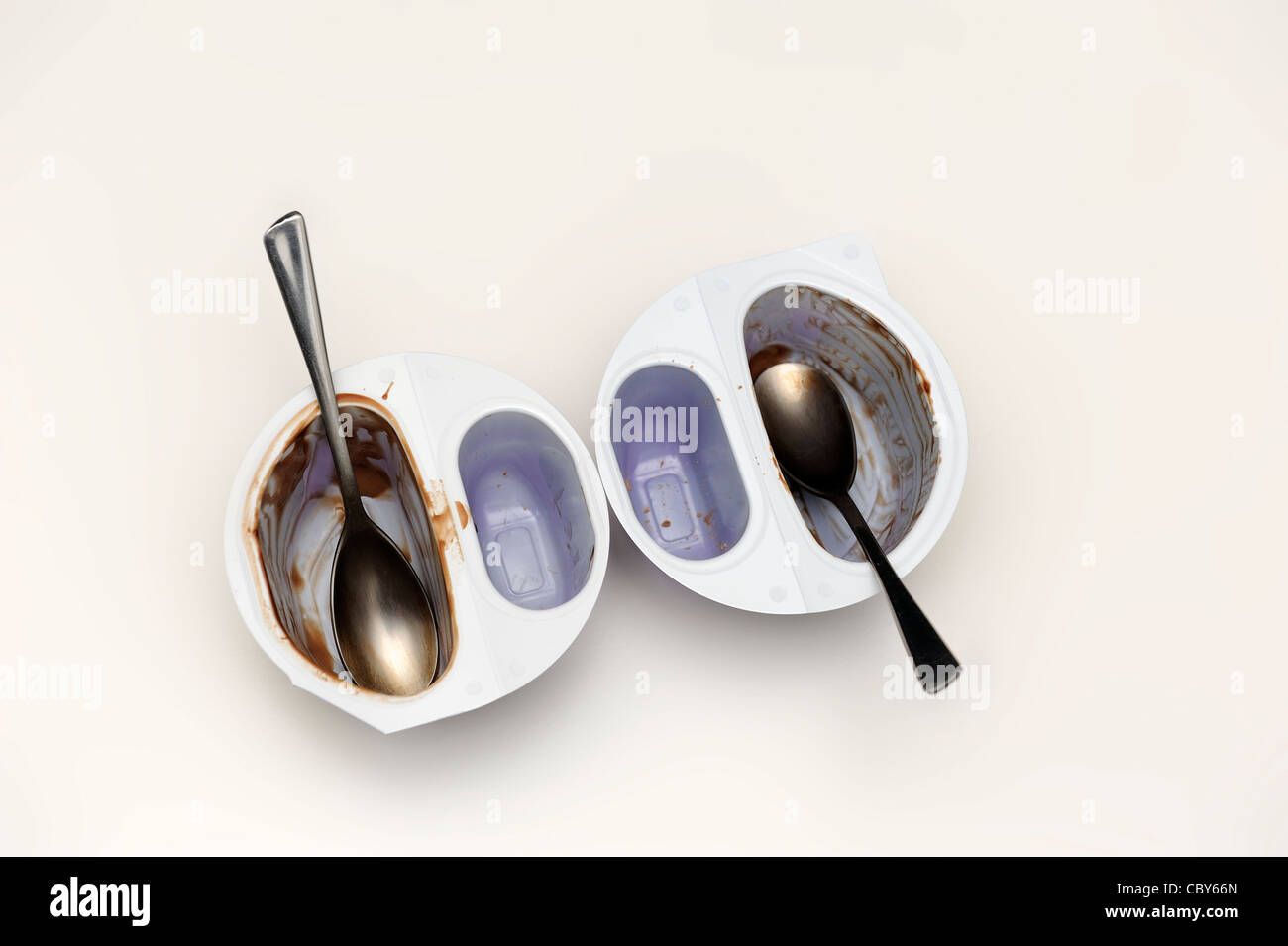 eaten chocolate dessert containers england uk Stock Photo - Alamy