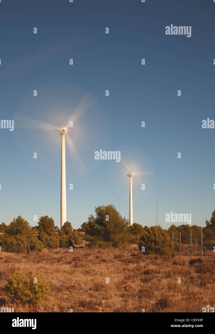 A pair of moving wind turbines Stock Photo - Alamy