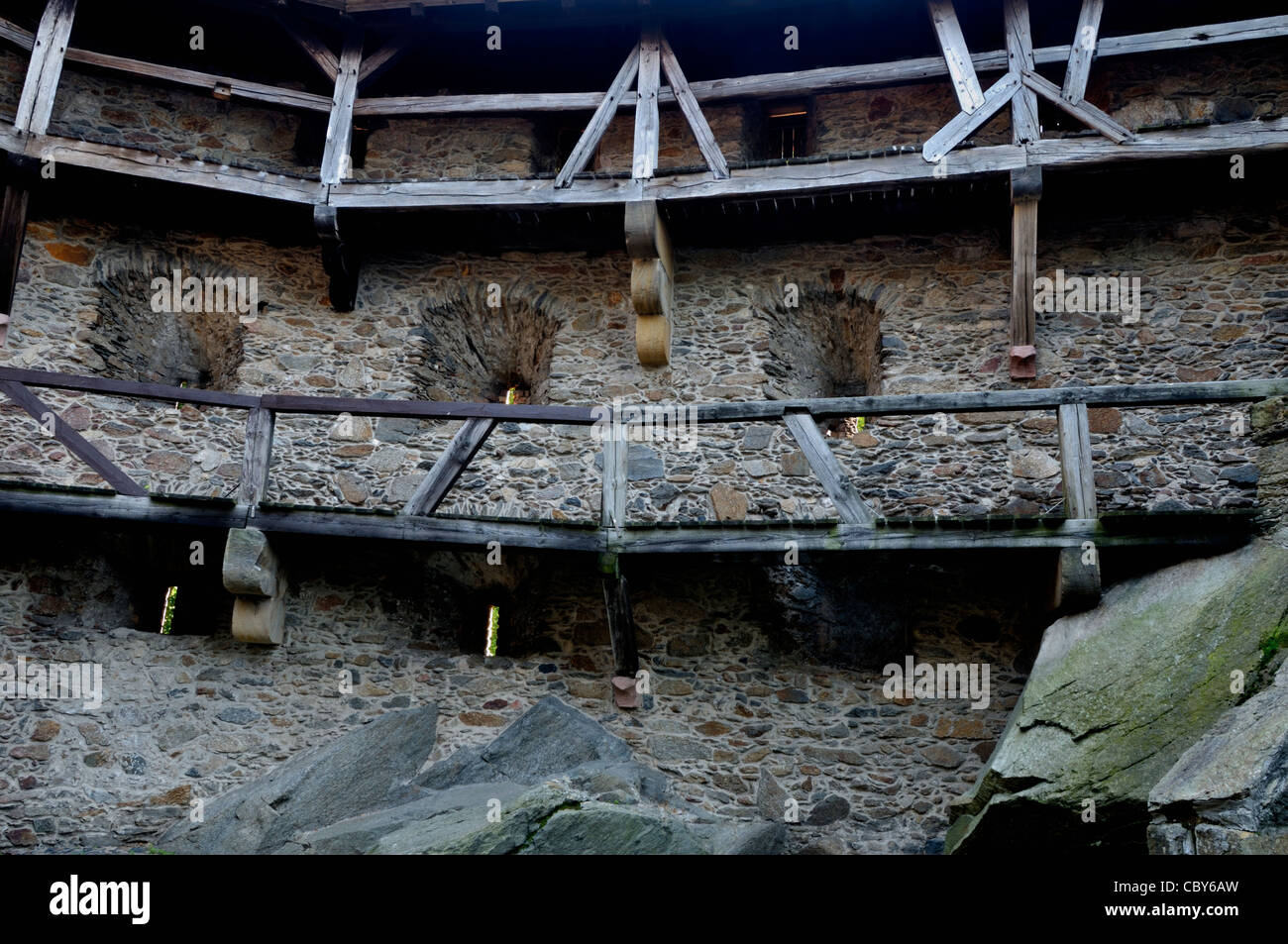 Wall of old medieval castle with defensive construction Stock Photo - Alamy