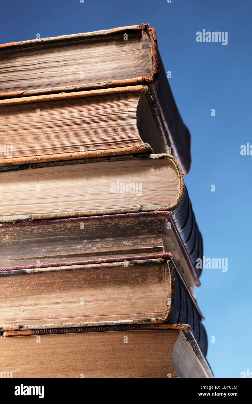 A Stack of old yellowed tattered books Stock Photo - Alamy
