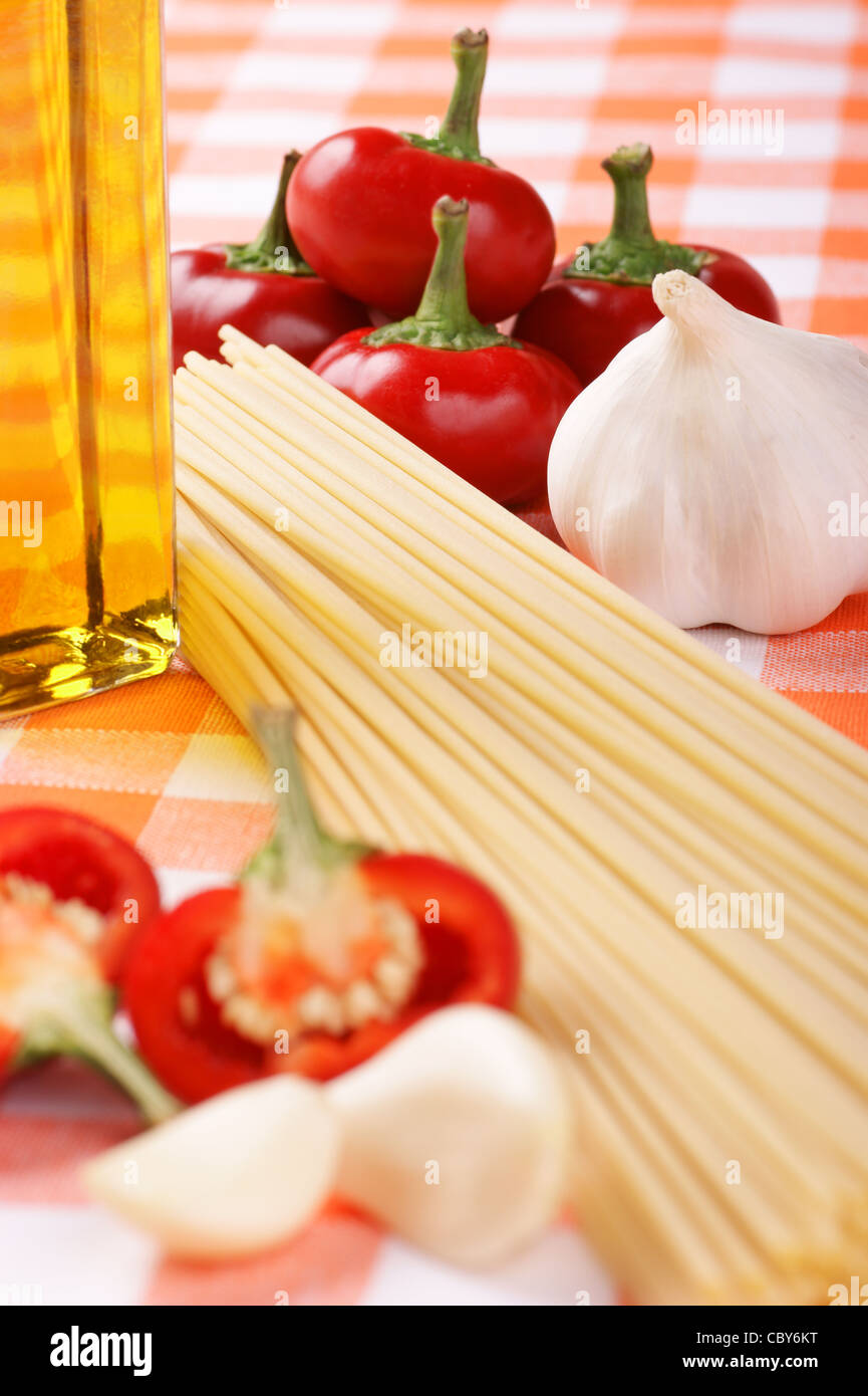 Italian spaghetti ingredients: extra-virgin olive oli, garlic and red ...