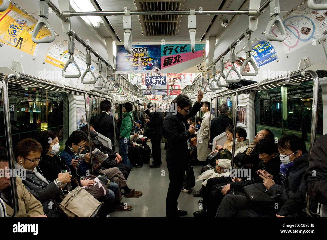 Tokyo busy subway station with commuters using the vast subway network ...