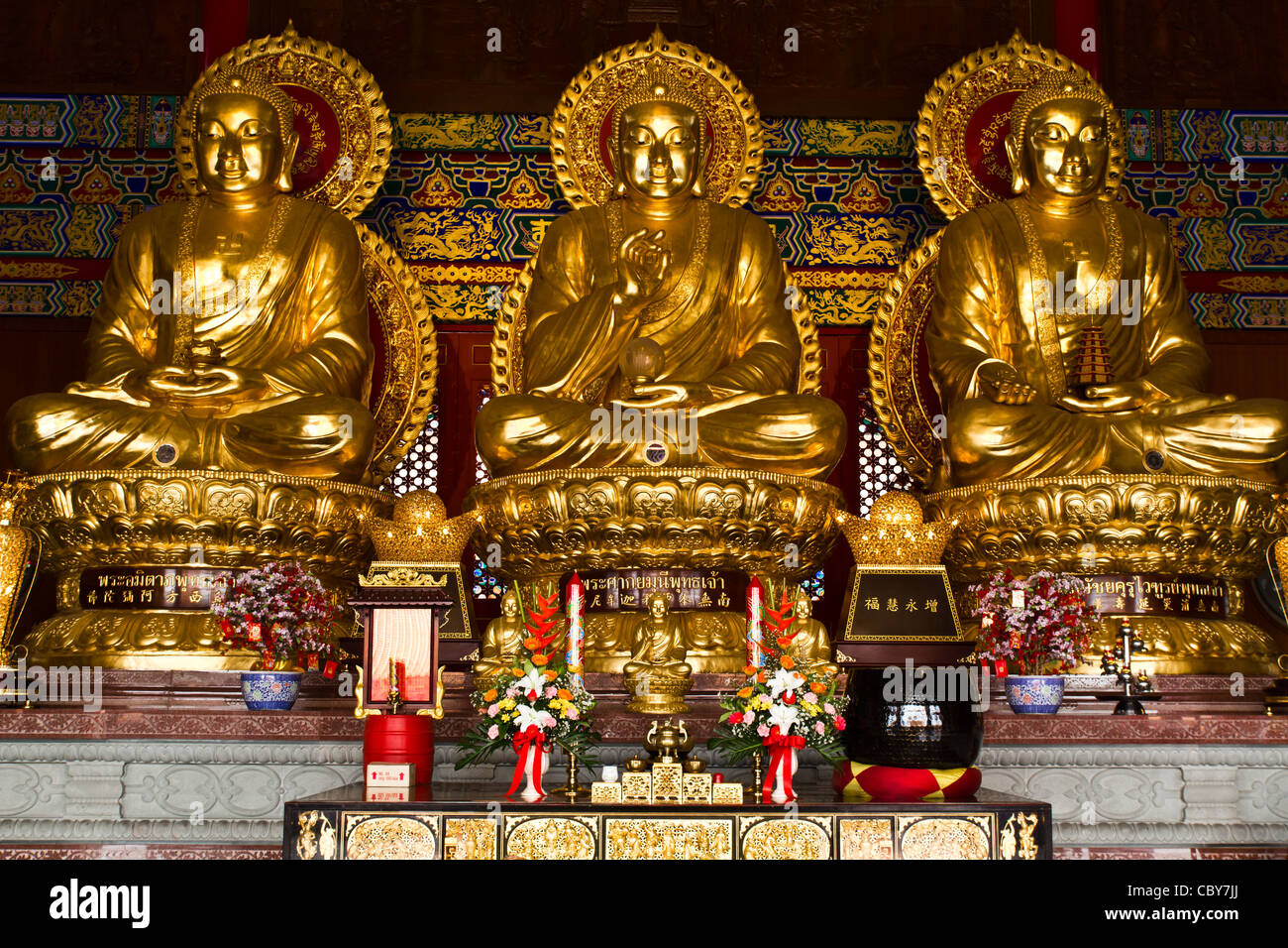 Three Buddhas in the Chinese temple of Thailand Stock Photo - Alamy