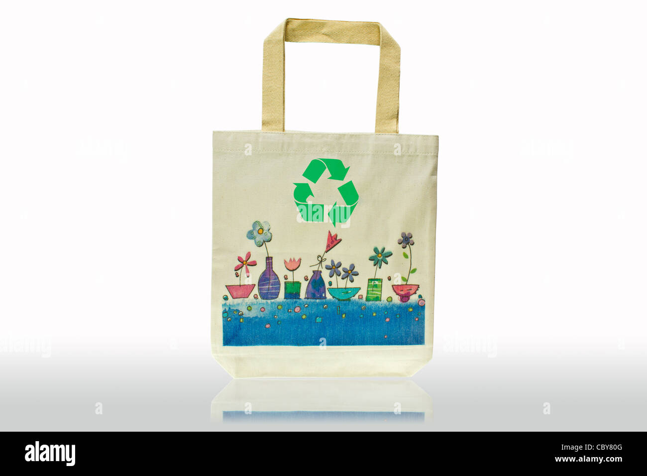 Shopping bag made out of recycled materials isolated on white ...