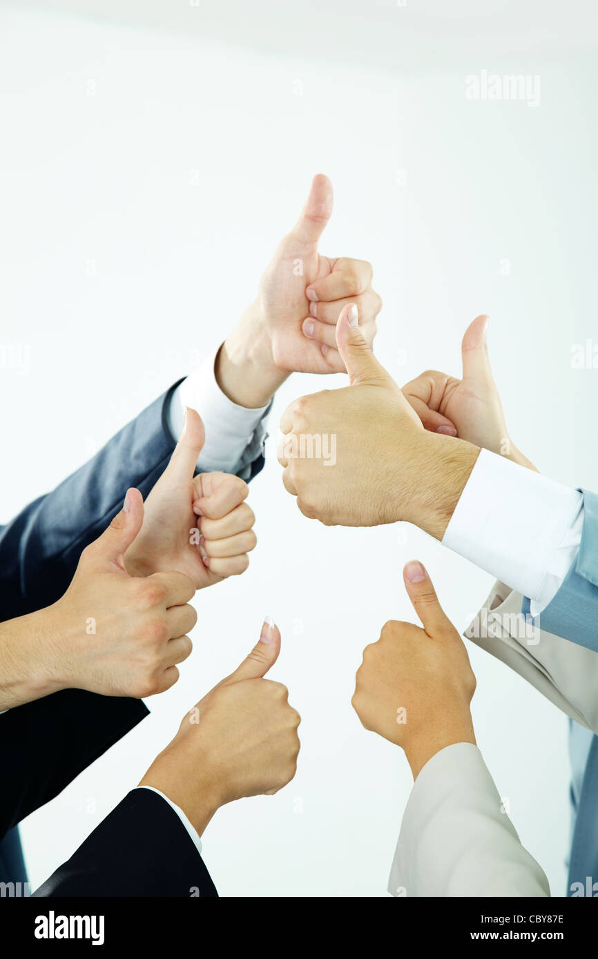 Image of several human hands showing thumbs up in isolation Stock Photo ...